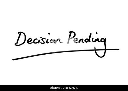 Decision Pending, handwritten on a white background Stock Photo - Alamy