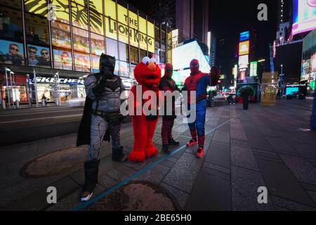 A man walks on a nearly empty Abu Nawas Street, in central Baghdad ...