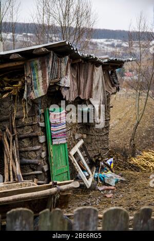 Old damaged house made from decayed rotten wooden beams Stock Photo - Alamy