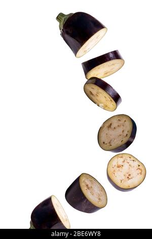 Falling eggplant isolated on white background, selective focus Stock ...
