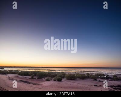 Sunrise over mudflats and mangroves of Roebuck Bay, Broome, The ...