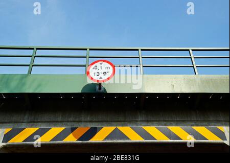 british road sign warning of height restriction, at a rail bridge in ...