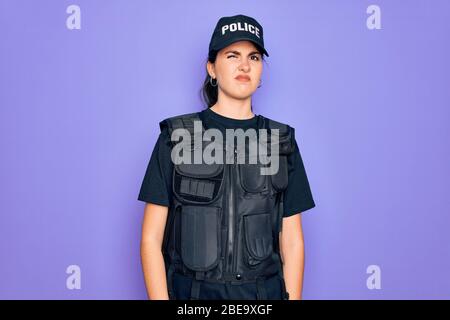 Grumpy looking police officer isolated on white background Stock Photo ...