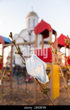 A protective mask in the background of the Christian church during the ...