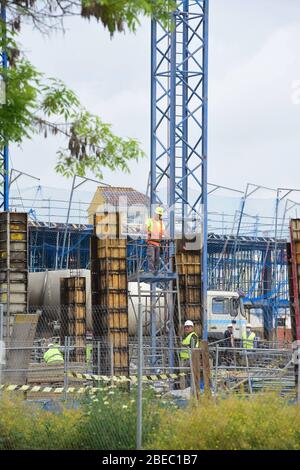Seville, Spain. 13th Apr, 2020. Contraction workers return to work ...