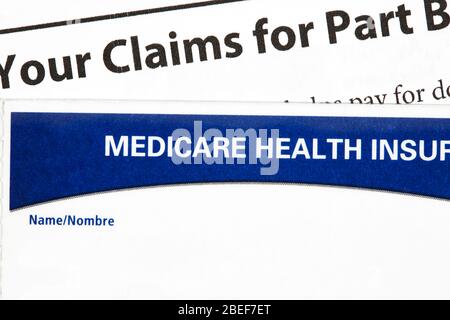 Medicare health insurance card with claims statement isolated on white ...