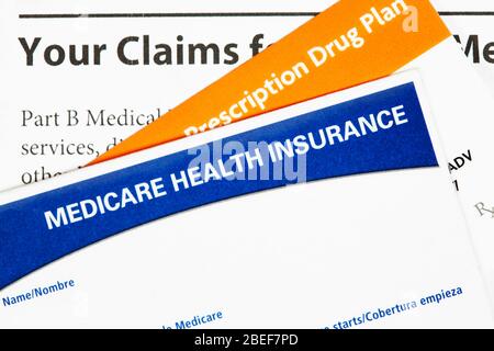 Medicare health insurance card with claims statement isolated on white ...