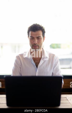 Portrait of handsome Turkish man relaxing at the coffee shop Stock ...