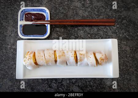 The Cantonese Dim Sum - rice noodle roll made with red rice and shrimp ...