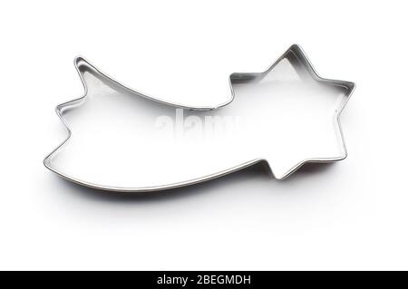 Tin foil comet shape for biscuits and gingerbread cooking isolated on ...