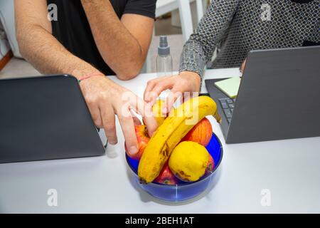 coworkers eating a salad during a work break Stock Photo - Alamy