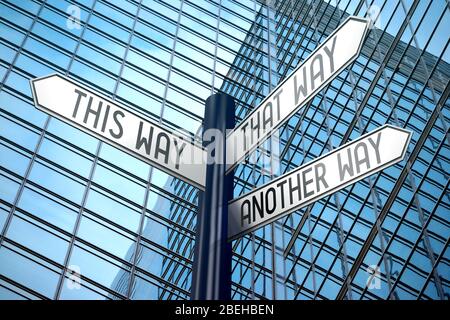 This way concept - crossroads sign, office building Stock Photo - Alamy
