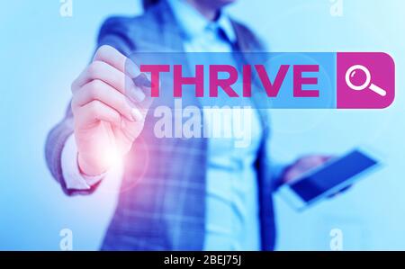 Text sign showing Thrive. Business photo showcasing Think positively ...