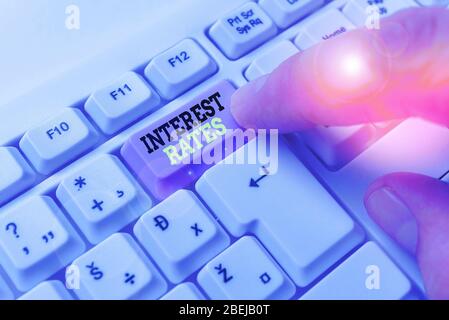 Writing note showing Interest Rate. Business concept for percentage of ...