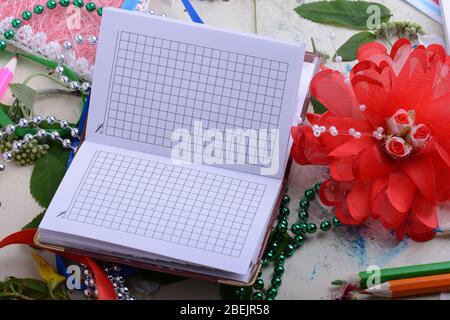 red hearts and note book on a table Stock Photo - Alamy