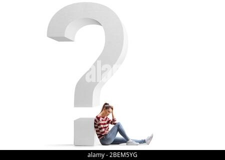 Young woman thinking with question mark circulation around her head ...