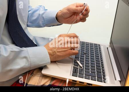 Man teleworking wearing shirt, tie and pajama pants Stock Photo - Alamy