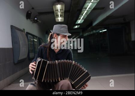 Tango performer with hat in the subway of Buenos Aires Stock Photo - Alamy