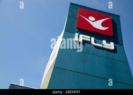 A logo sign outside of a iFly Indoor Skydiving location in Baltimore ...