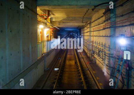 Underground subway track system tunnel Stock Photo - Alamy