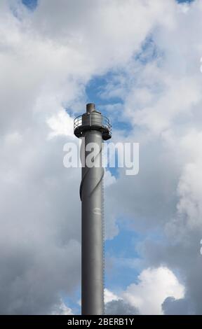 Helical strakes or corkscrew fin at the top of a district heating power ...