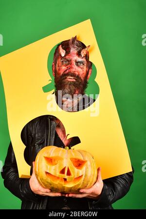 A male wearing pumpkin on head Stock Photo - Alamy