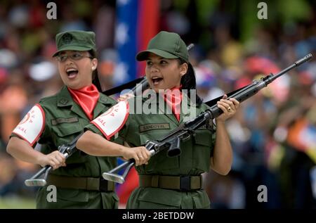 Venezuelan reserve troop female soldiers march during a military parade ...