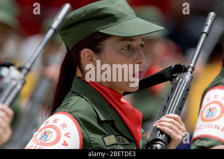 Venezuelan reserve troop female soldiers march during a military parade ...