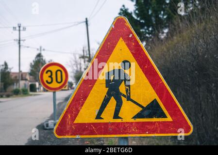 road reconstruction and warning signs for vehicles and pedestrians ...