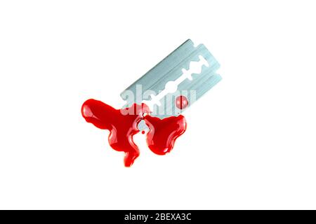 Photo of Razor blade with a drop of blood on white background Stock ...