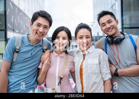 The portrait of happiness of college students play outdoors Stock Photo ...