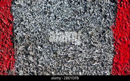Closeup of red tarmac background. Texture of a tarmac road Stock Photo ...