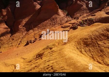 The nice yellow and red sandstone rocks by Roussillon in France. The ...