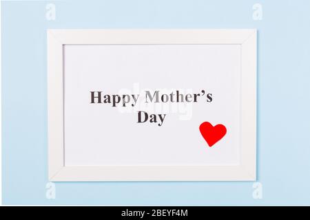 Picture with text HAPPY MOTHER'S DAY and pencils on pink background ...