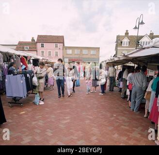 1992, Ely town Centre, and market place, east England, UK with people ...