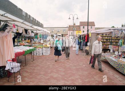 1992, Ely town Centre, and market place, east England, UK with people ...