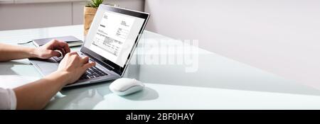 E Invoice Tax And Accounting Software At Home Stock Photo - Alamy
