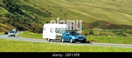 Car towing caravan on european motorway Stock Photo - Alamy