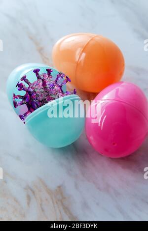Coronavirus hatching from plastic easter eggs as symbol for the holiday ...