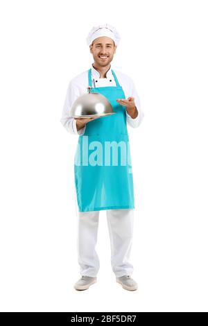 Handsome male chef with tray and cloche on white background Stock Photo ...