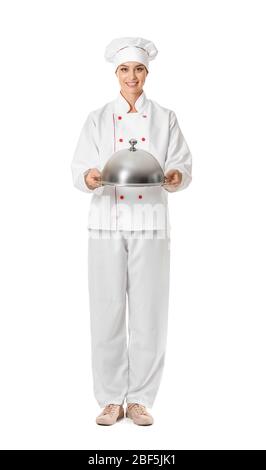 Beautiful female chef with tray and cloche on white background Stock ...