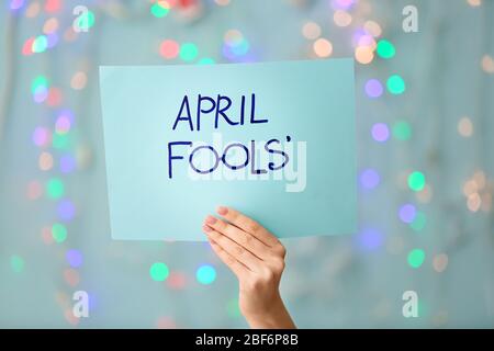 Paper sheet with text APRIL FOOL'S DAY on color background Stock Photo ...