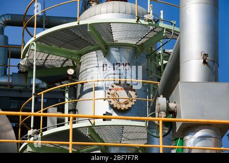 New green metal manhole on the land. Repair work. The closed sunroof ...