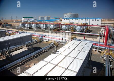 Oil refinery plant in desert. Heat exchanger and pipelines ...