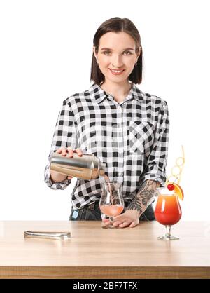 Beautiful female bartender at table against white background Stock ...