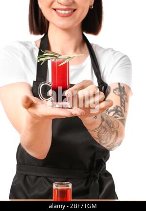Beautiful female bartender at table against white background Stock ...
