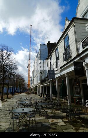 Empty chairs and tables are seen outside a Vincent cafe coffee shop in ...