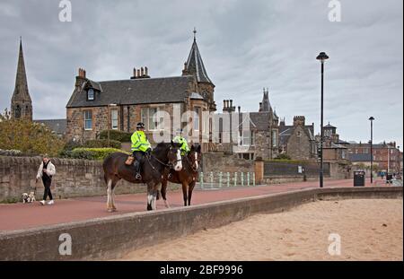 Police Scotland mounted officers on patrol during the 2014 Edinburgh ...