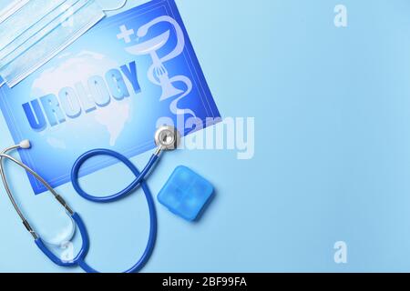 Paper sheet with text UROLOGY on color background Stock Photo - Alamy