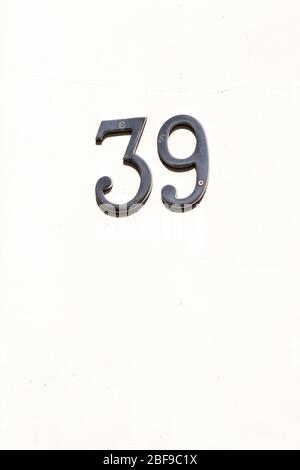 House number 39 sign on wall Stock Photo - Alamy